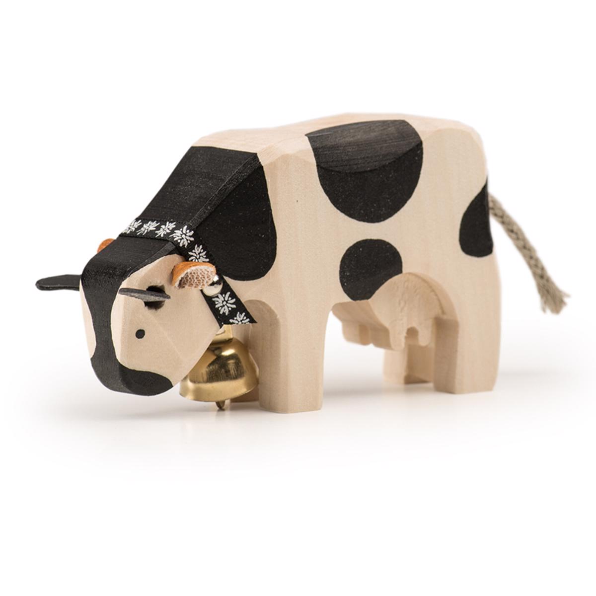 Trauffer Shop - Trauffer Holzspielwaren /Kühe - Cow 1 eating Freiburg